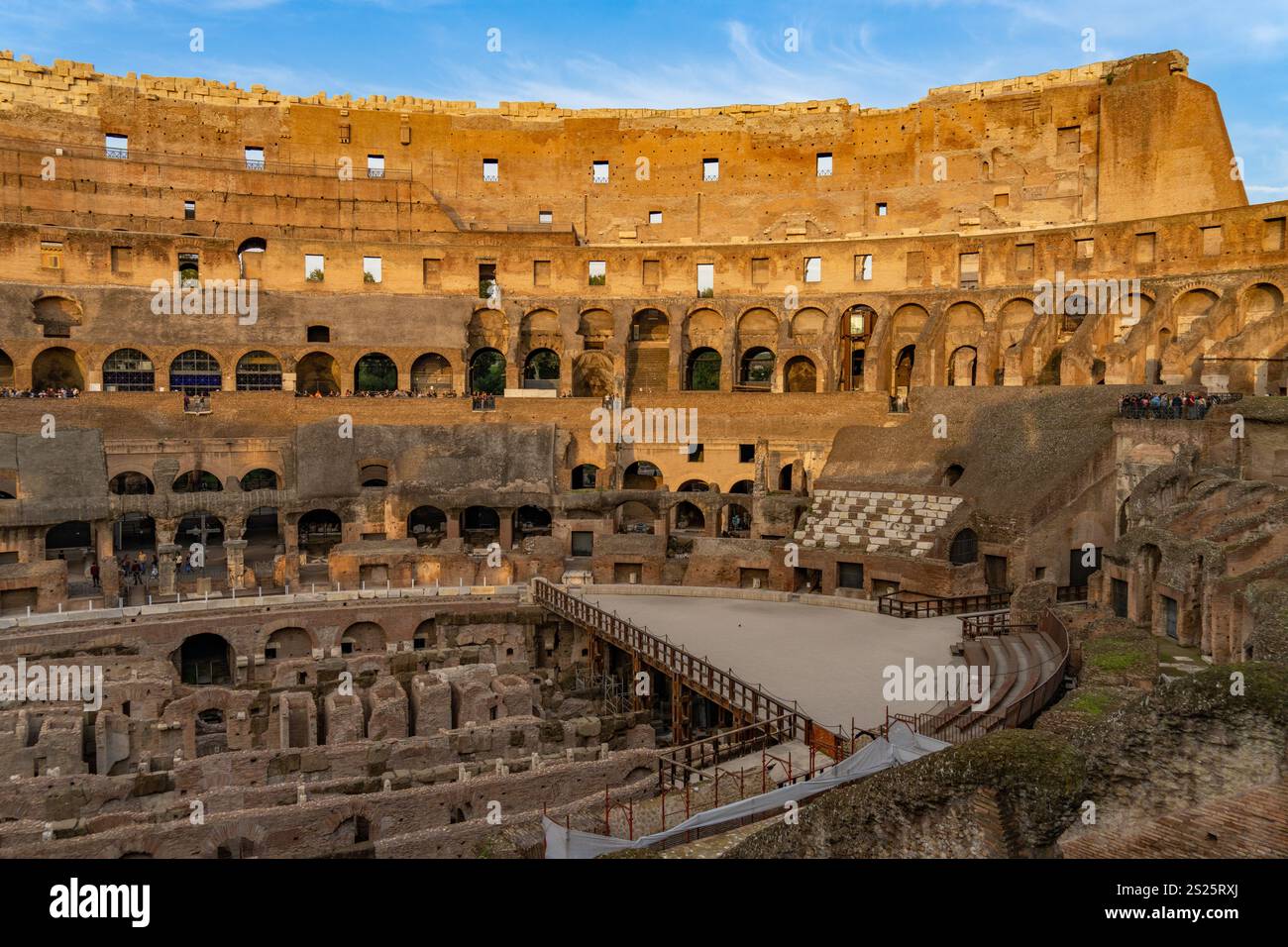 Interior of the Roman Colosseum or Flavian Amphitheater with golden ...