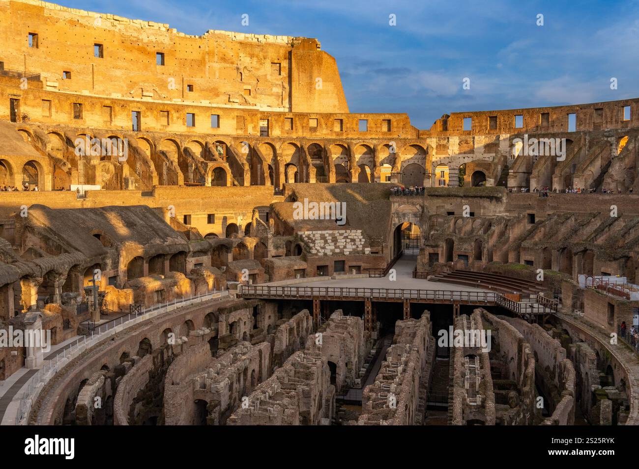 Interior of the Roman Colosseum or Flavian Amphitheater with golden ...