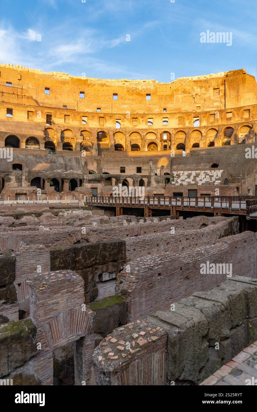 Interior of the Roman Colosseum or Flavian Amphitheater with golden ...