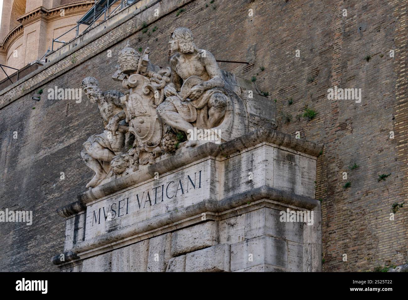 Statues over the entrance to the Vatican Museums in the city wall of ...