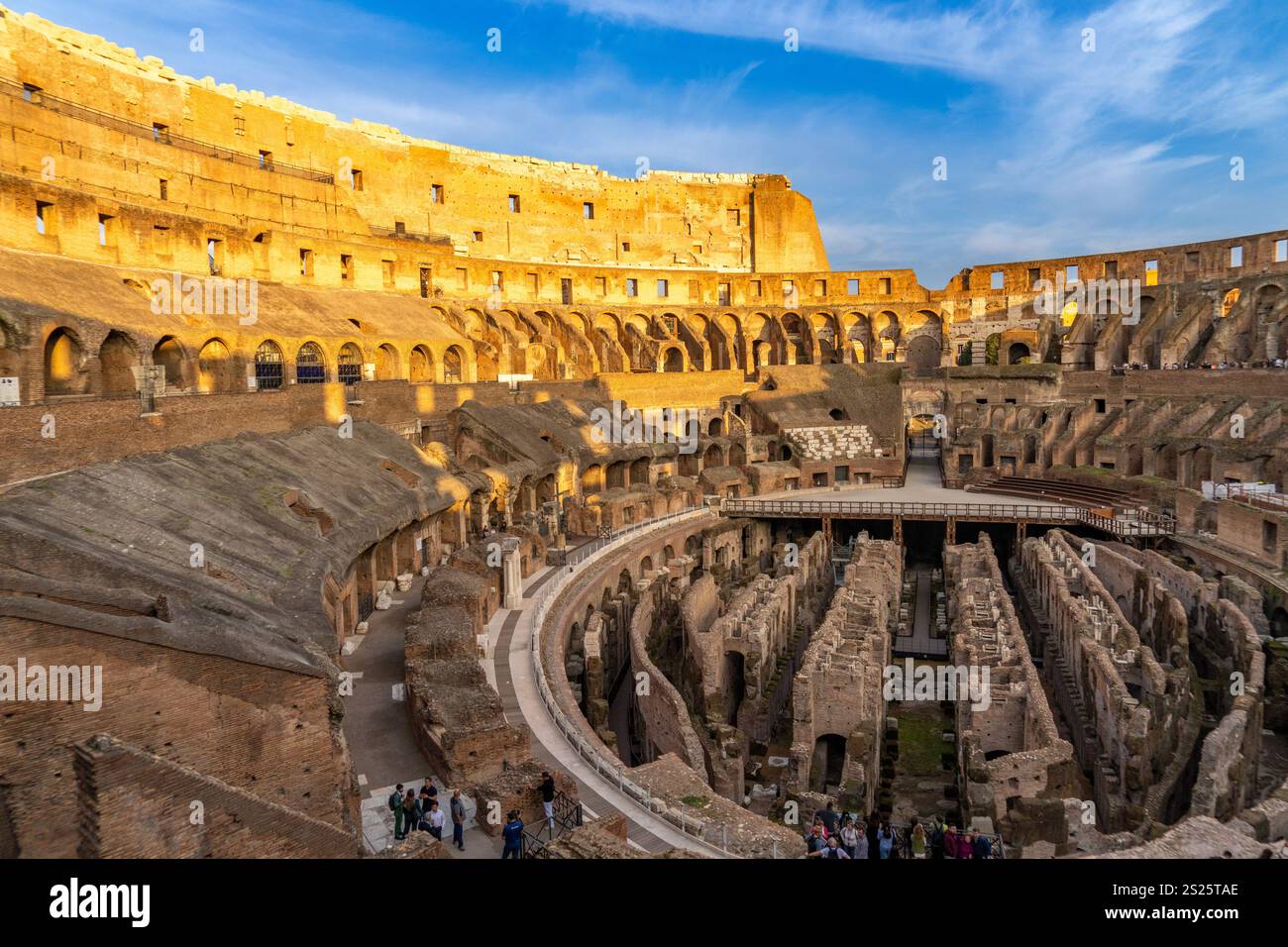 Interior of the Roman Colosseum or Flavian Amphitheater with golden ...