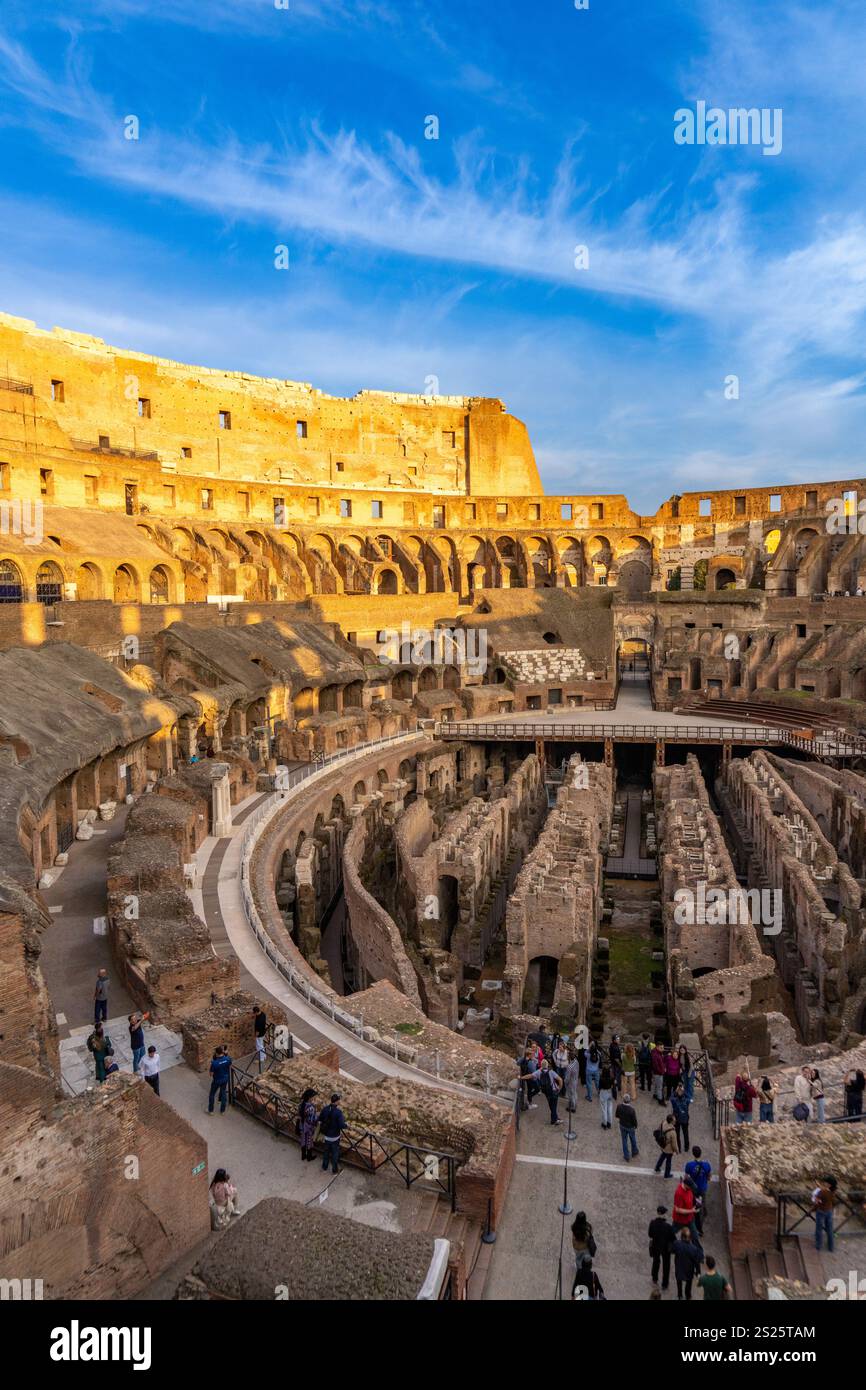 Interior of the Roman Colosseum or Flavian Amphitheater with golden ...