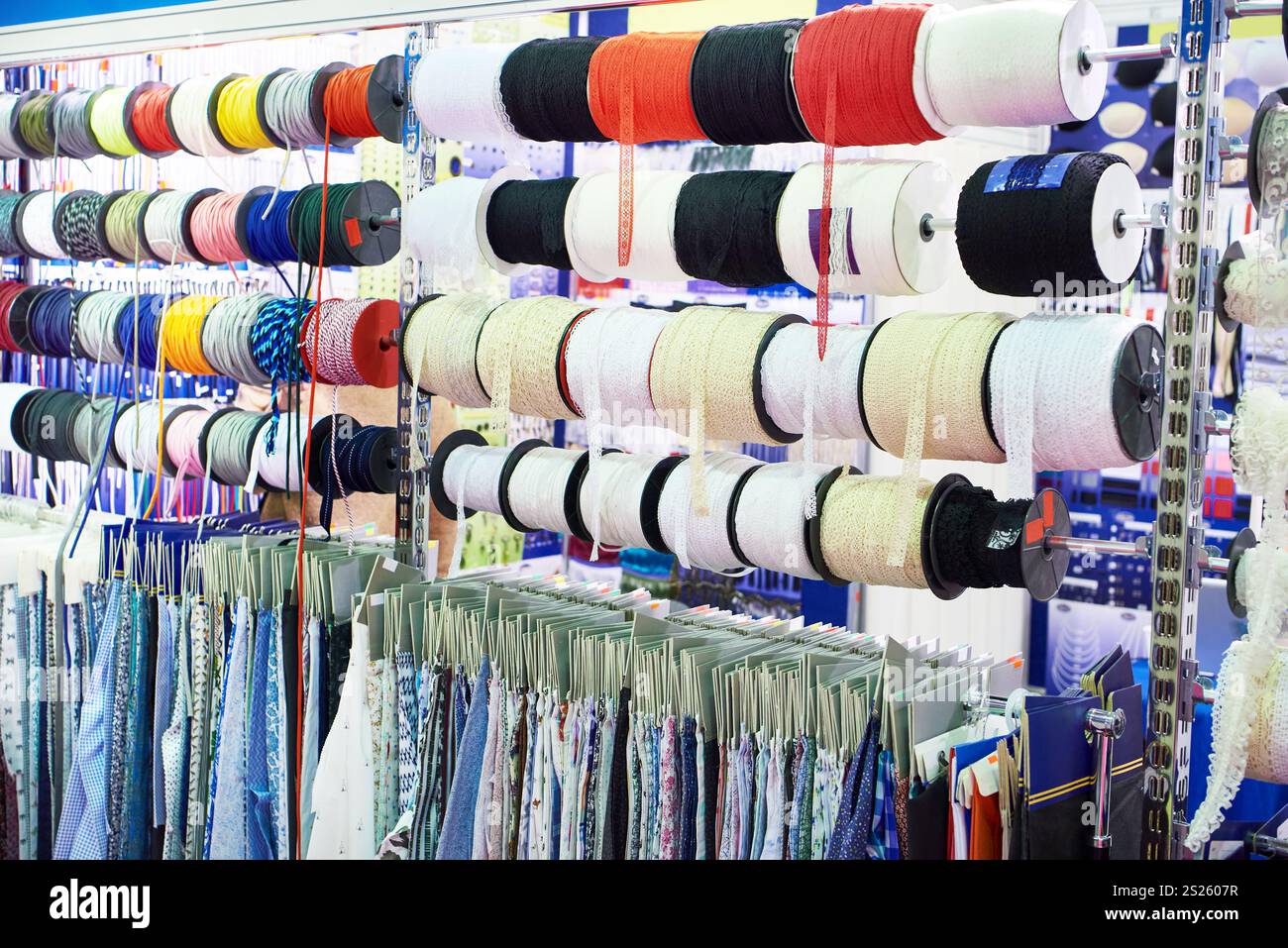 Ribbons, braid and cords for clothing in the store Stock Photo - Alamy