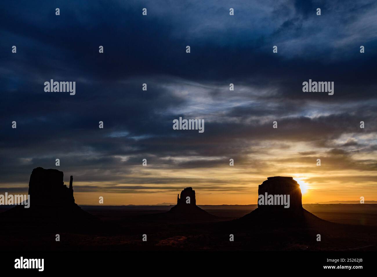 Captivating sunrise at Monument Valley, showcasing the iconic Mittens ...