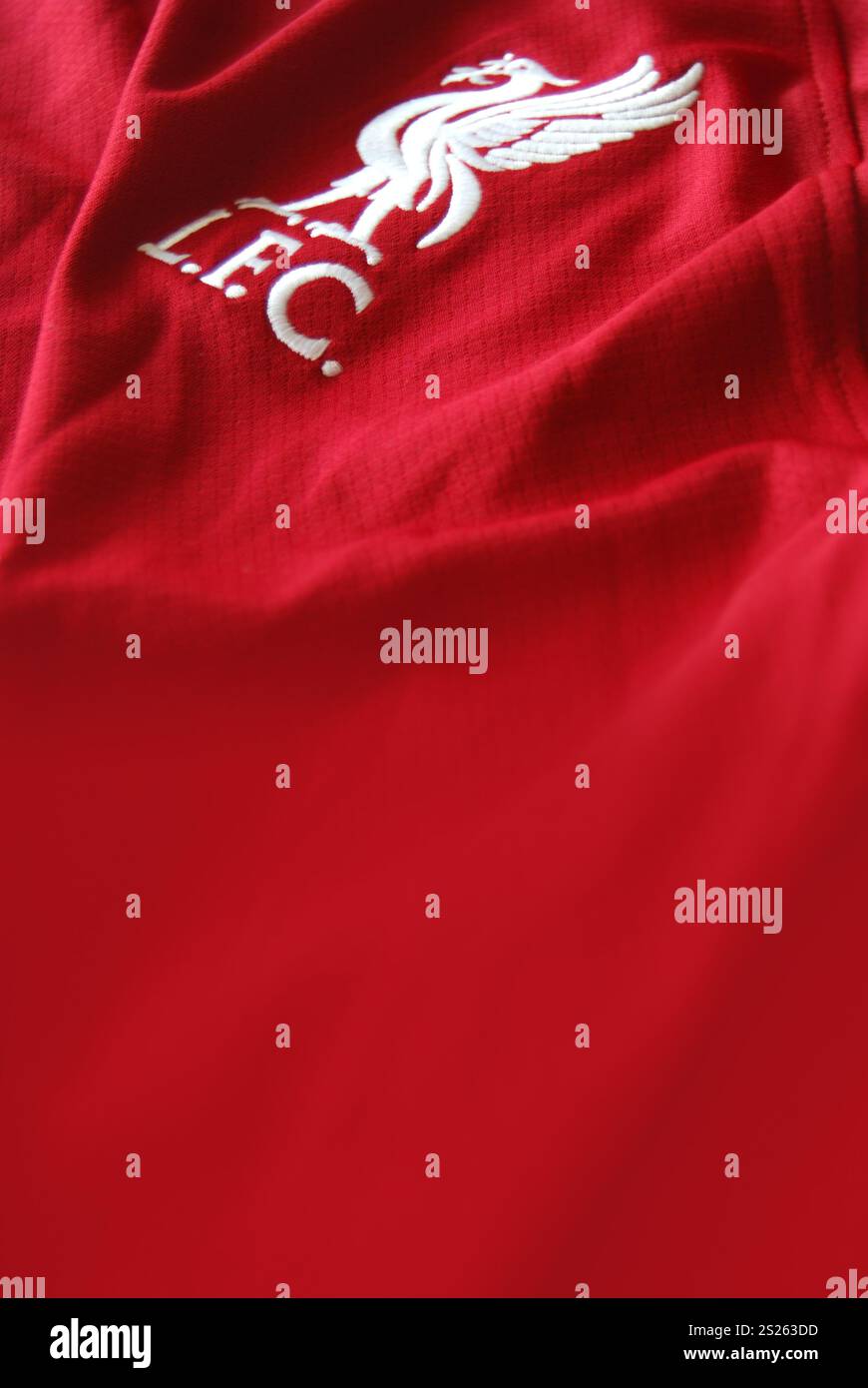 Angled close up photo of Liverpool FC club badge on the shirt with ...