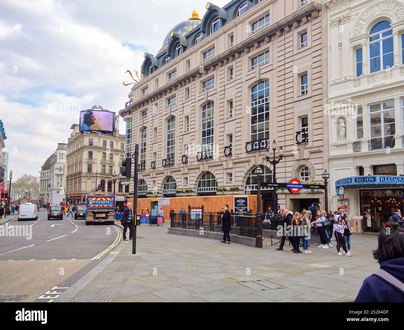 London, United Kingdom - March 28, 2019: Urban view of historic buildings, shops, and ...