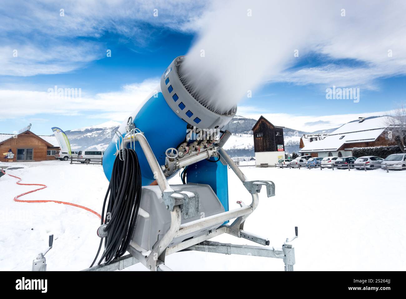 Big snow cannon making artificial snow at cold on ski slope Stock Photo ...