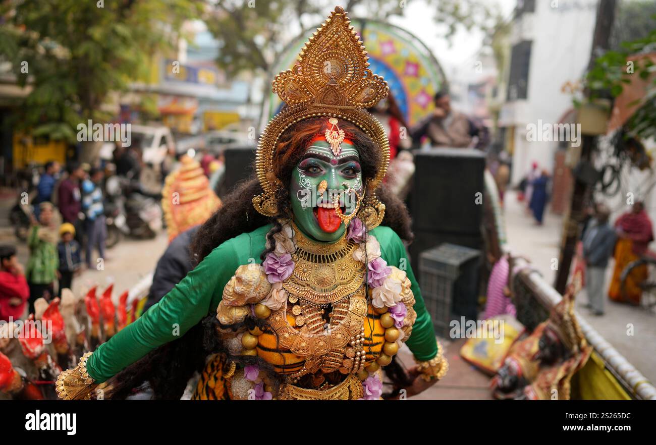 An Indian man dressed as Hindu goddess Kali dances during Shri Anand ...