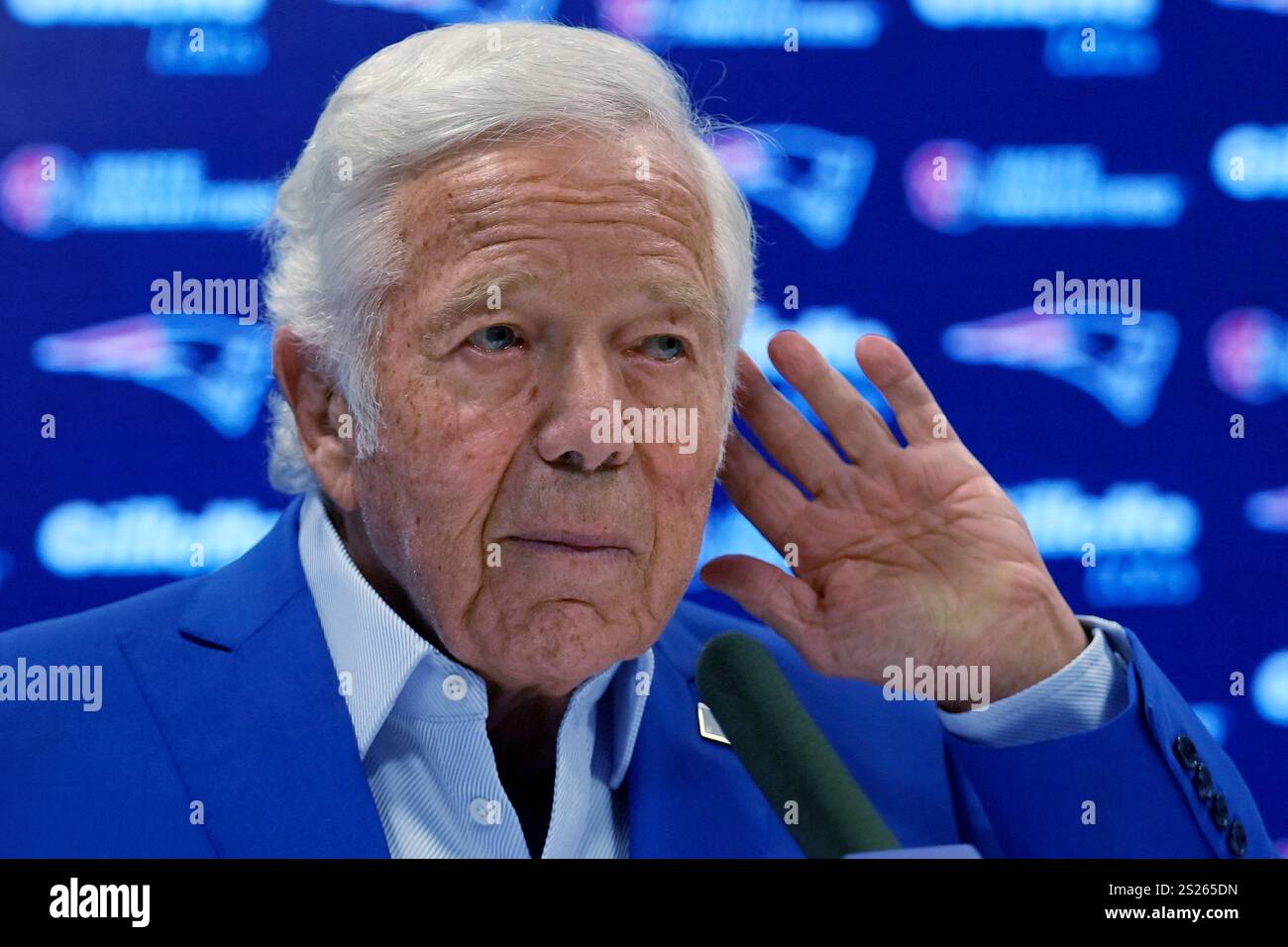 New England Patriots owner Robert Kraft listens to a reporter's ...