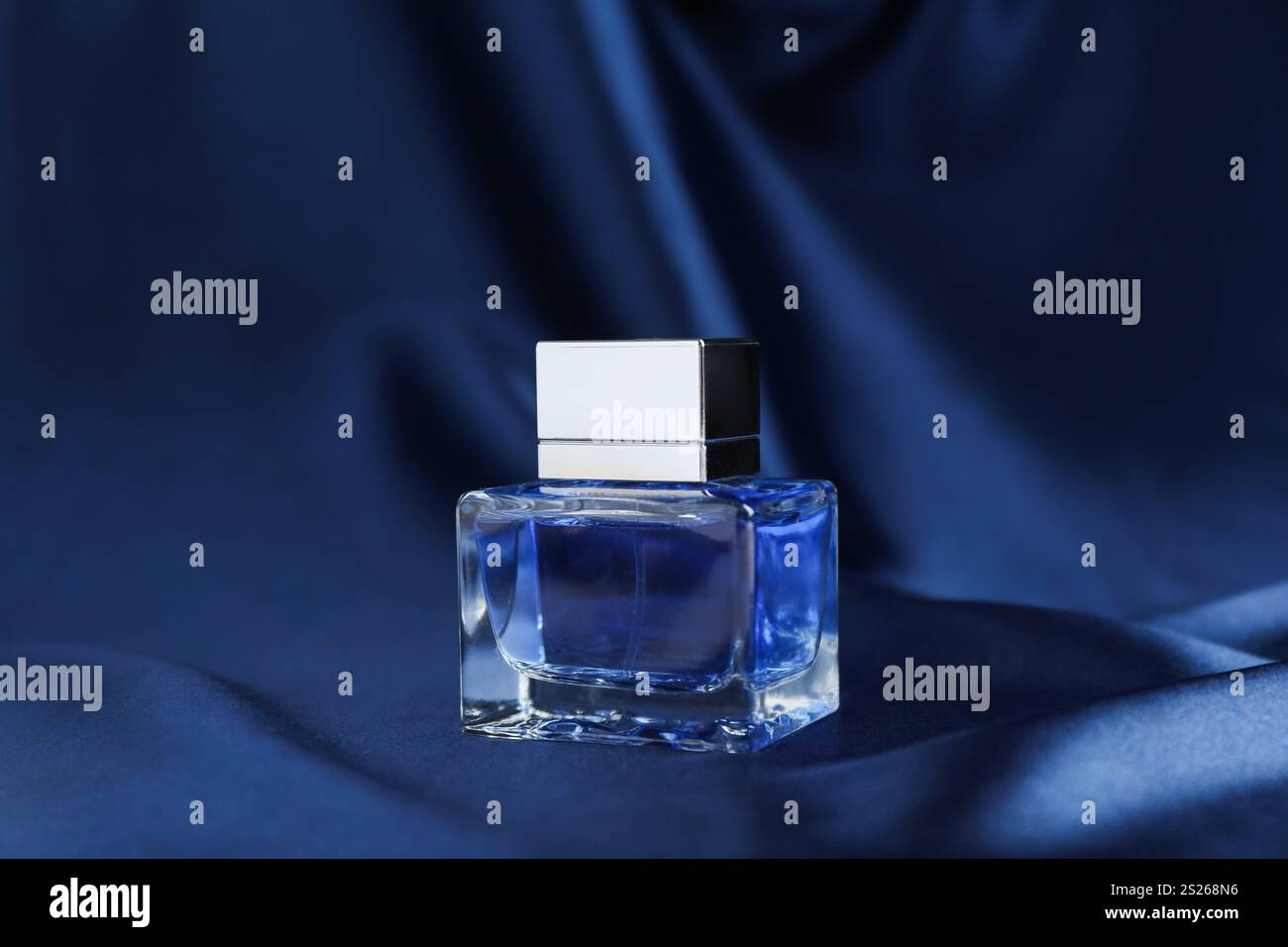 Dark blue glass perfume hi-res stock photography and images - Alamy