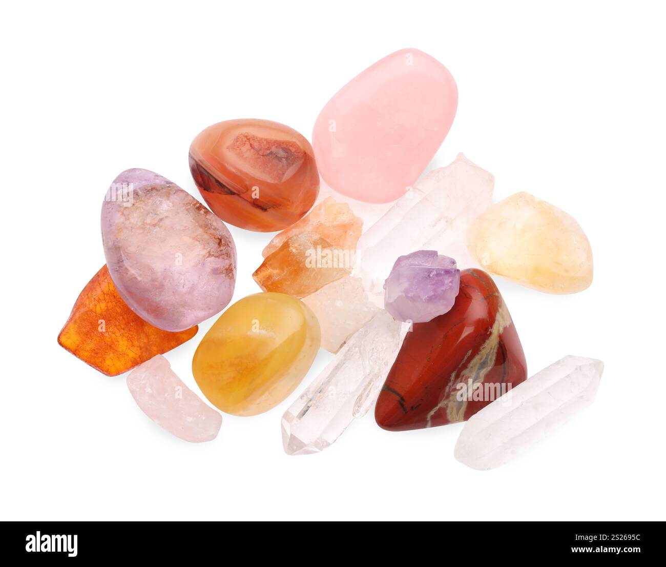 Pile of different natural mineral stones isolated on white, top view ...
