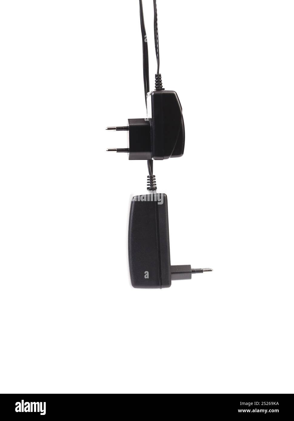 Electric power adapters. Close up. White background Stock Photo - Alamy