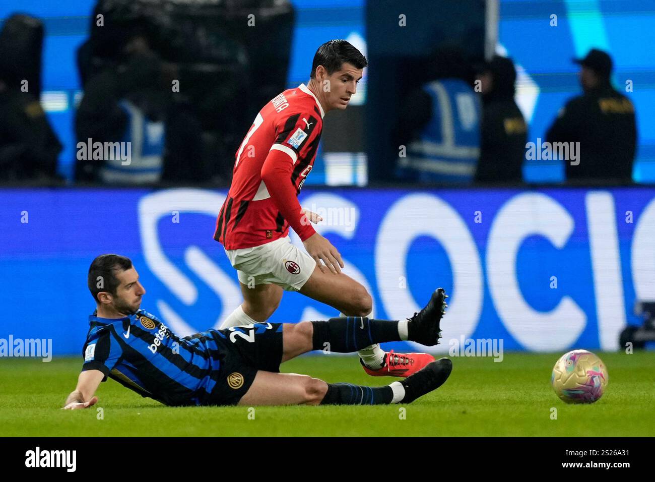 Inter Milan's Henrikh Mkhitaryan, left, challenges AC Milan's Alvaro ...