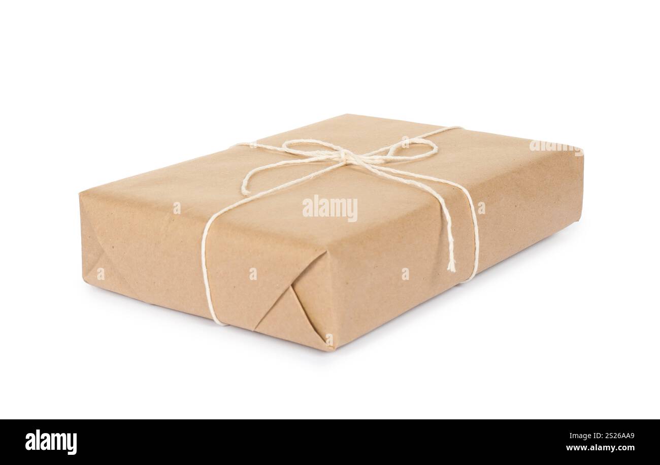 One parcel box wrapped in paper isolated on white Stock Photo - Alamy