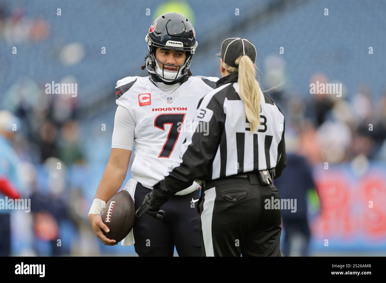 Houston Texans quarterback C.J. Stroud (7) talks with NFL down judge ...