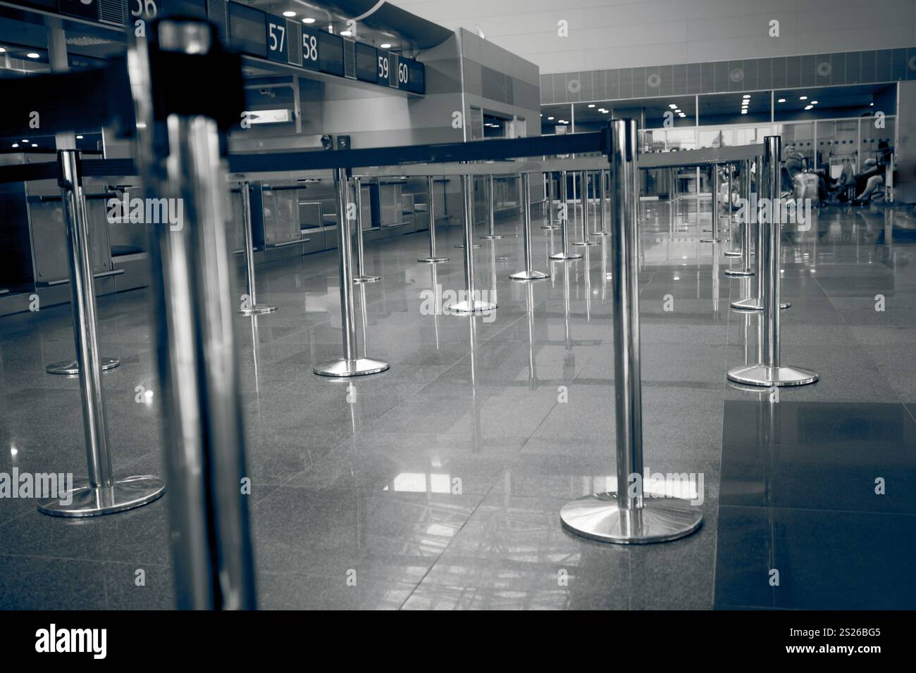 Black and white photo of check-in line at airport Stock Photo - Alamy