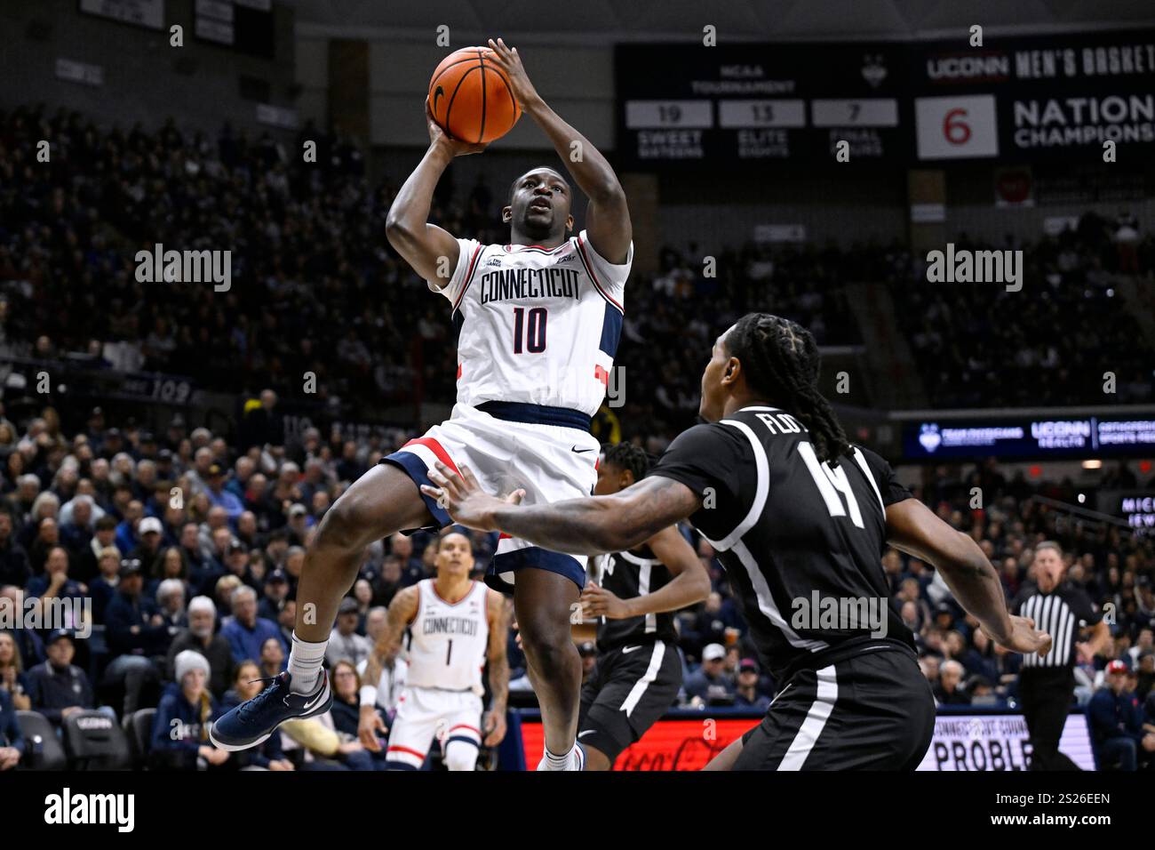 UConn guard Hassan Diarra (10) goes up to the basket as Providence ...