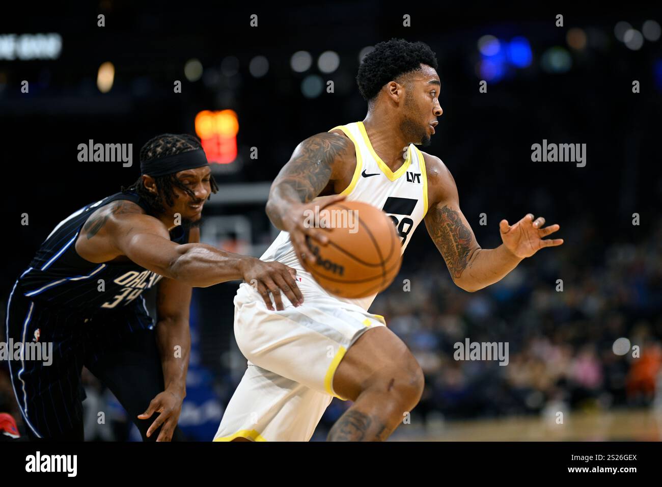 Utah Jazz forward Brice Sensabaugh (28) drives past Orlando Magic ...