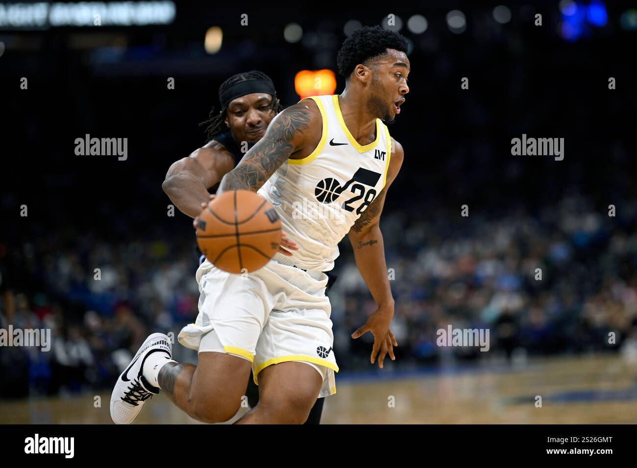 Utah Jazz forward Brice Sensabaugh (28) drives past Orlando Magic ...
