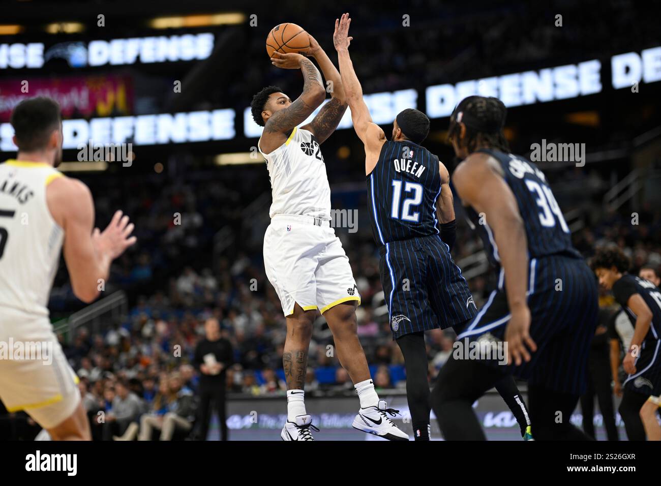 Utah Jazz forward Brice Sensabaugh (28) shoots in front of Orlando ...