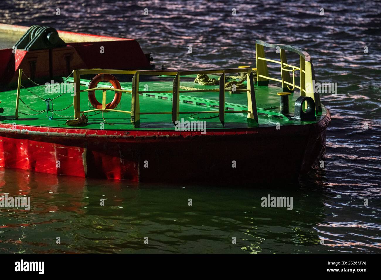 Bow of a red construction barge Stock Photo - Alamy
