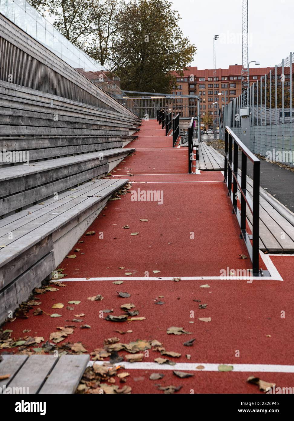 Tartan deck in a walkway by a sports arena Stock Photo - Alamy