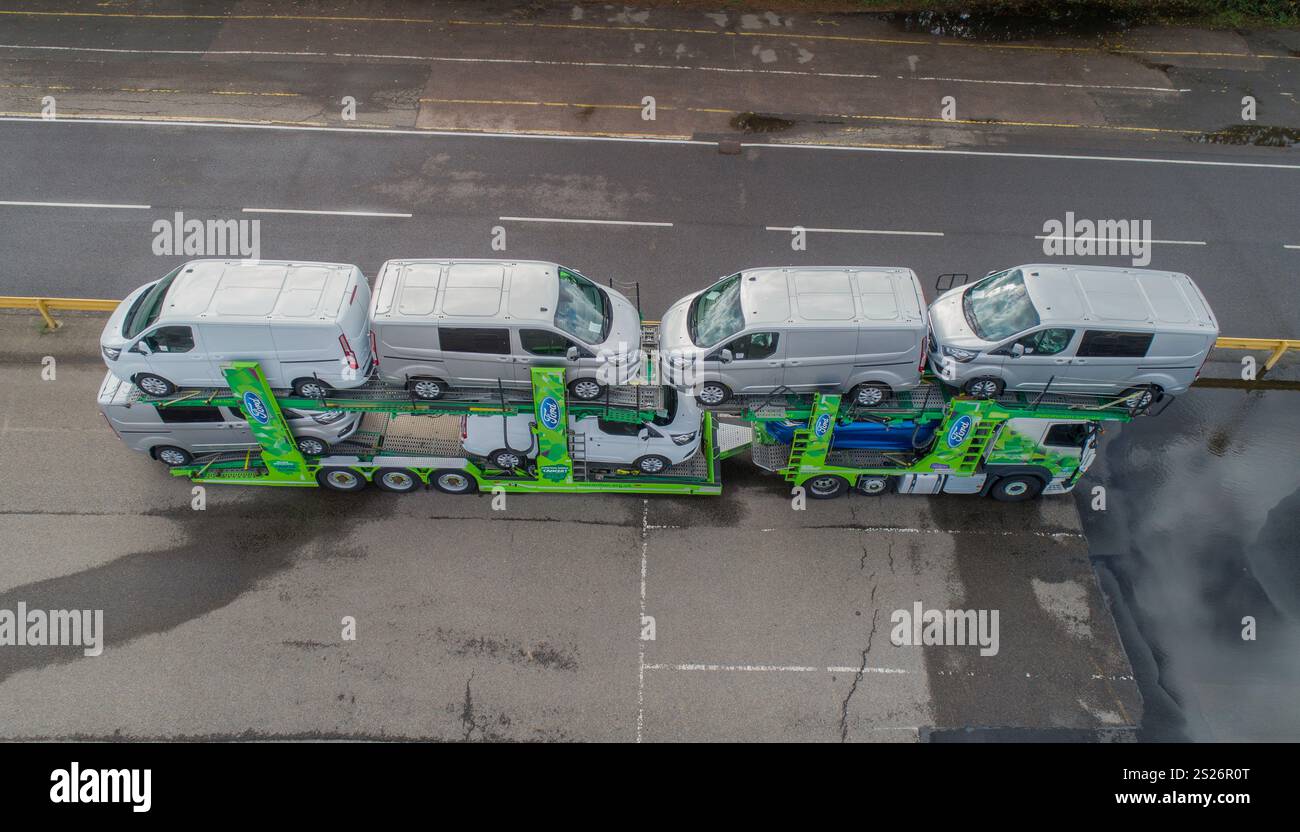 Car transporter truck loaded with new Ford Transit vans ready for ...