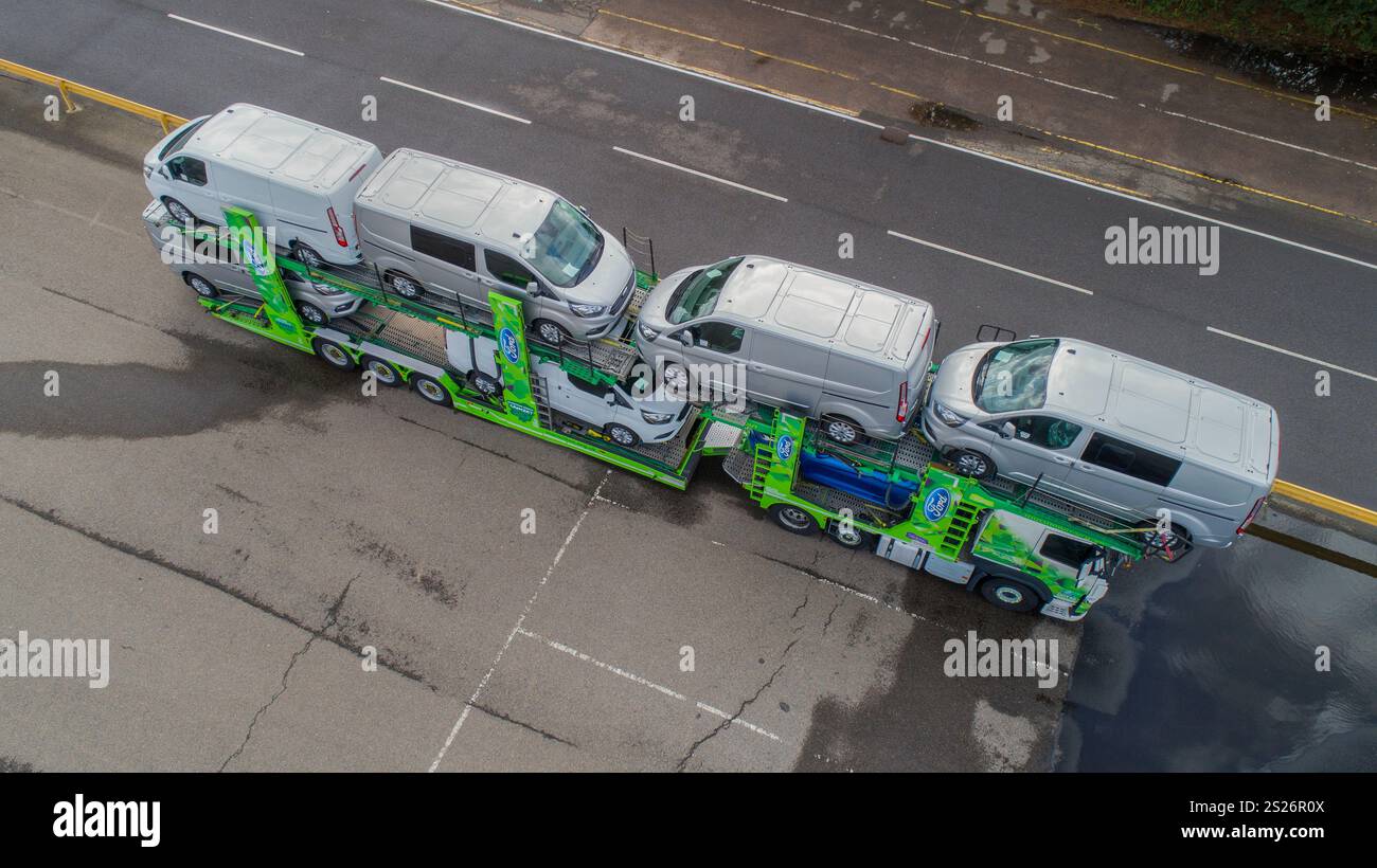 Car transporter truck loaded with new Ford Transit vans ready for ...