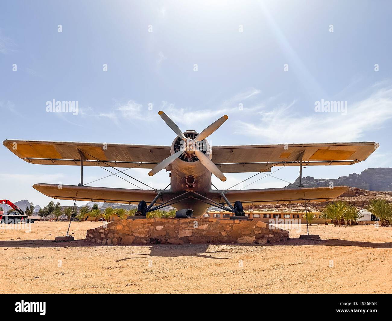 An old world war two plane parked in the middle of the desert Stock ...
