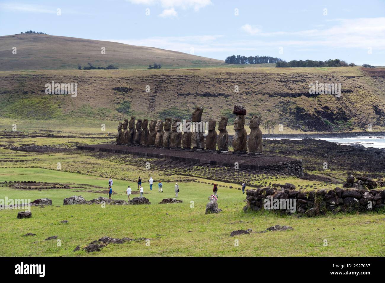 A tour group visits Ahu Tongariki, Easter Island’s largest monument with 15 standing moai ...