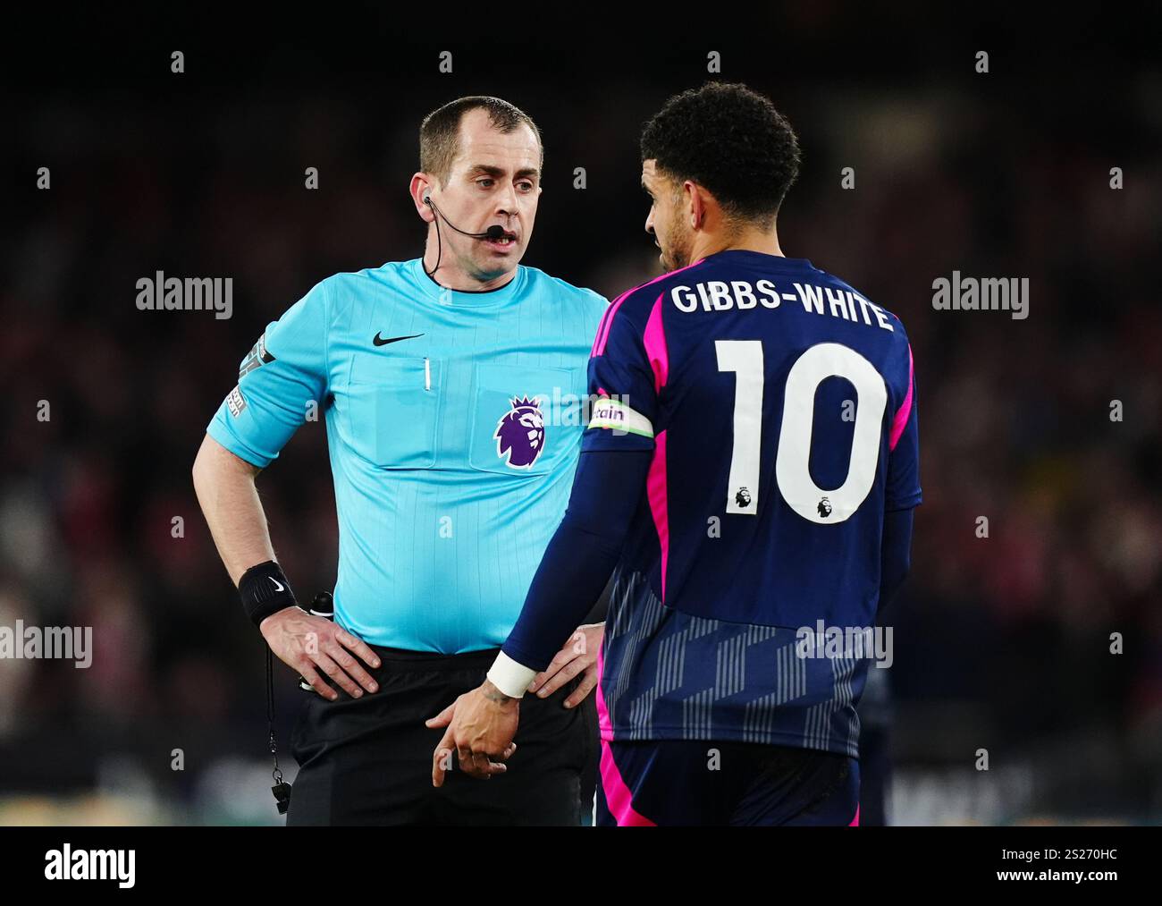 Referee Peter Bankes speaks to Nottingham Forest's Morgan Gibbs-White ...