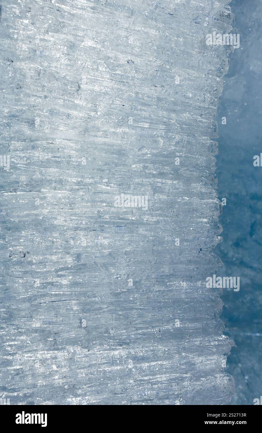 Glacial block of ice with interesting structure crystals macro. Winter ...