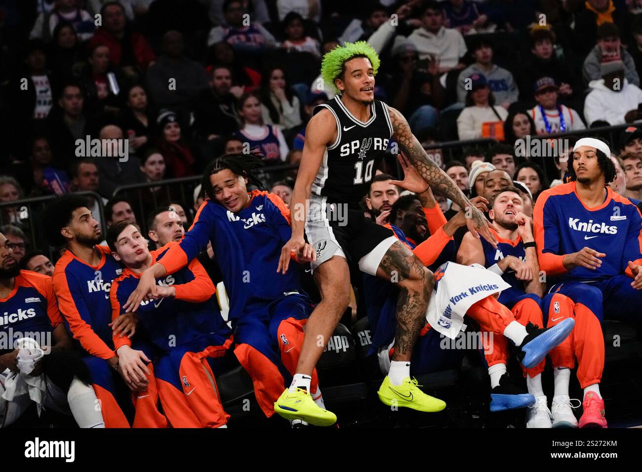 San Antonio Spurs' Jeremy Sochan throws the ball back in-bounds as he ...