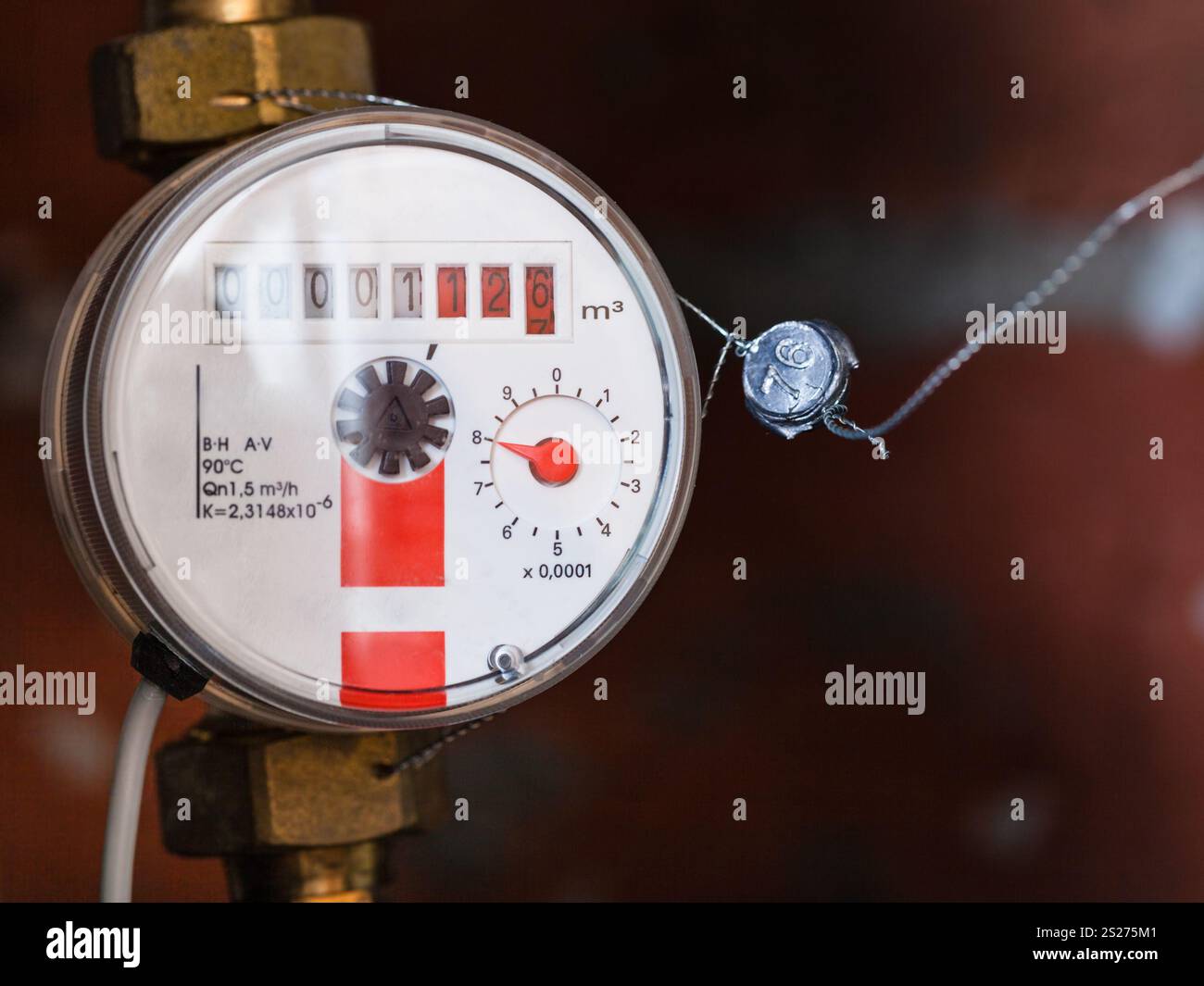 one new mechanical hot water meter on pipe close up Stock Photo - Alamy