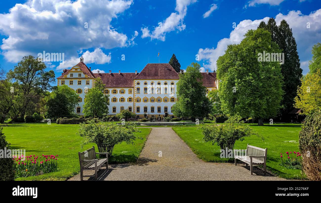 The picturesque castle or palace Salem in Germany in the perfect garden ...