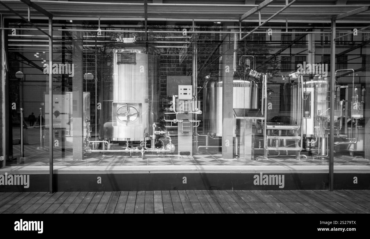 Black and white photo of big cisterns and pipes in brewery Stock Photo ...