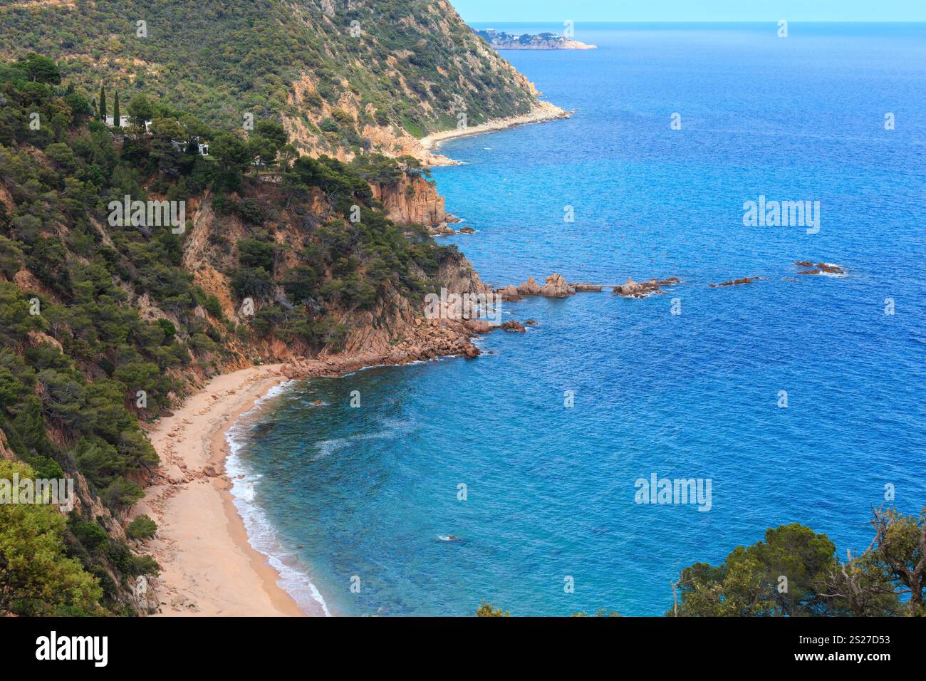 Summer sea rocky coast view with sandy Beach Cala del Senyor Ramon ...