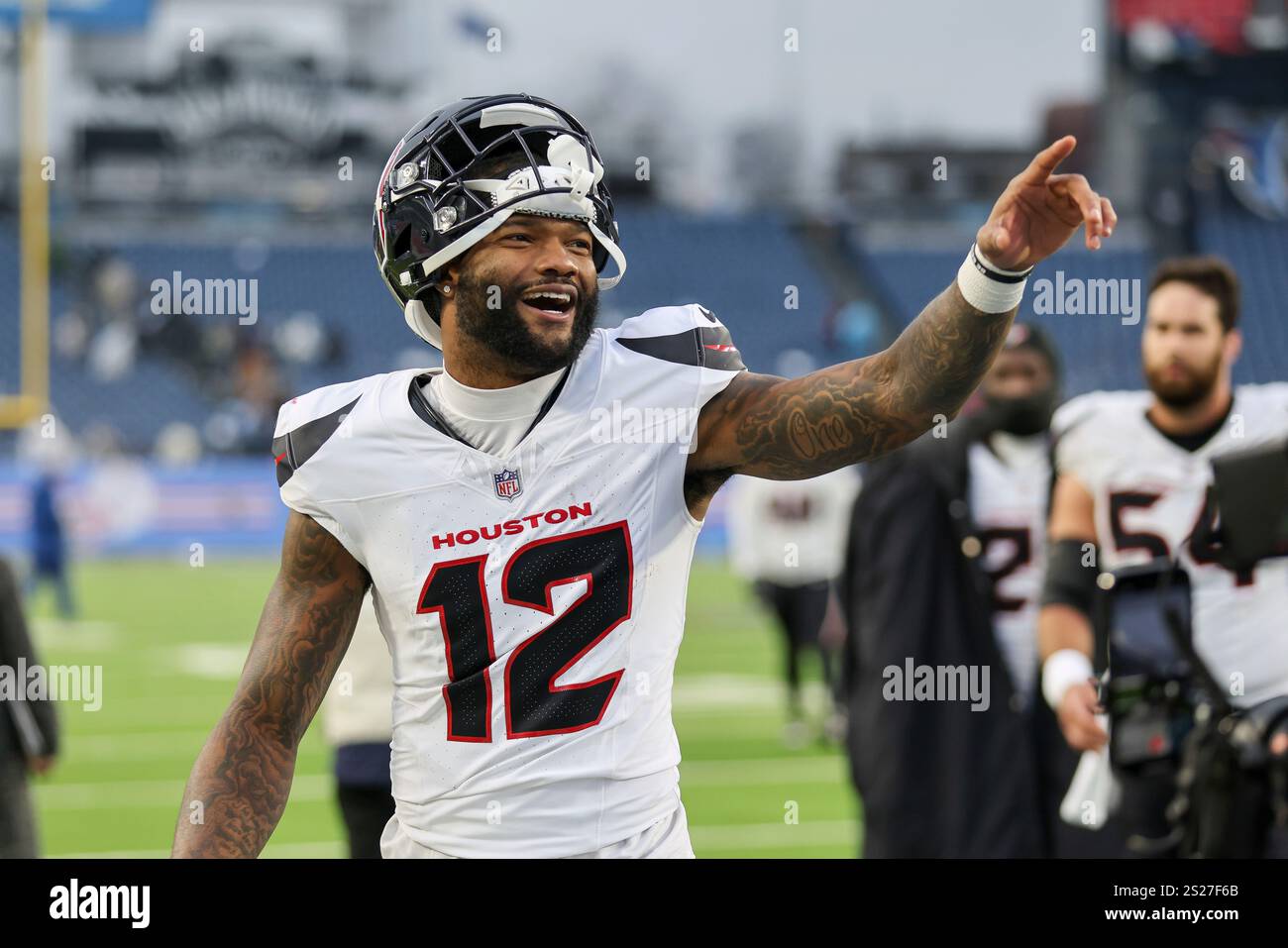 Houston Texans wide receiver Nico Collins (12) walks off the field ...