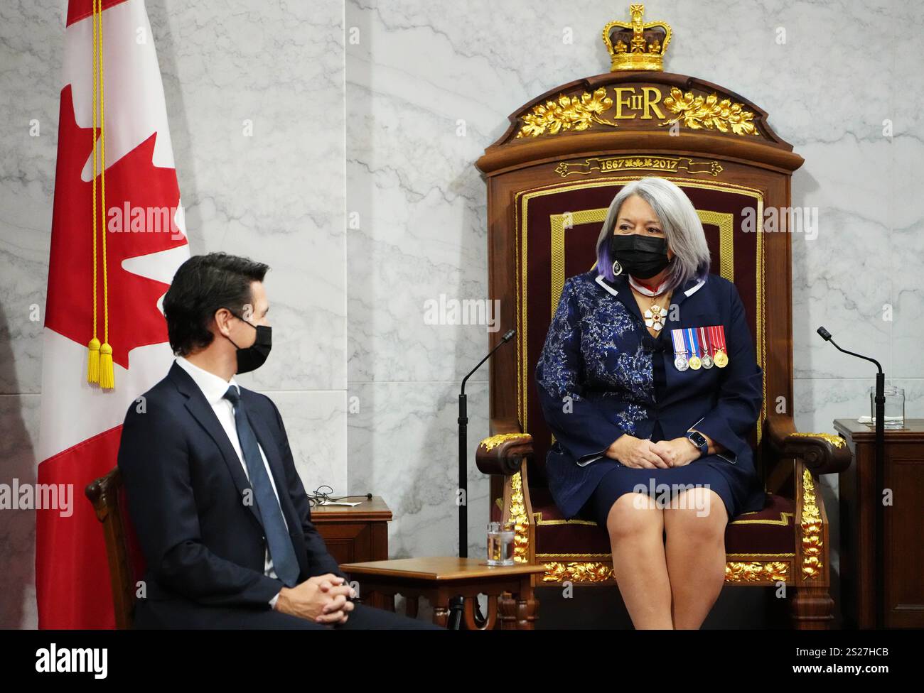 Ottawa, Canada. 23rd Nov, 2021. Prime Minister Justin Trudeau looks at Gov. Gen. Mary Simon ...