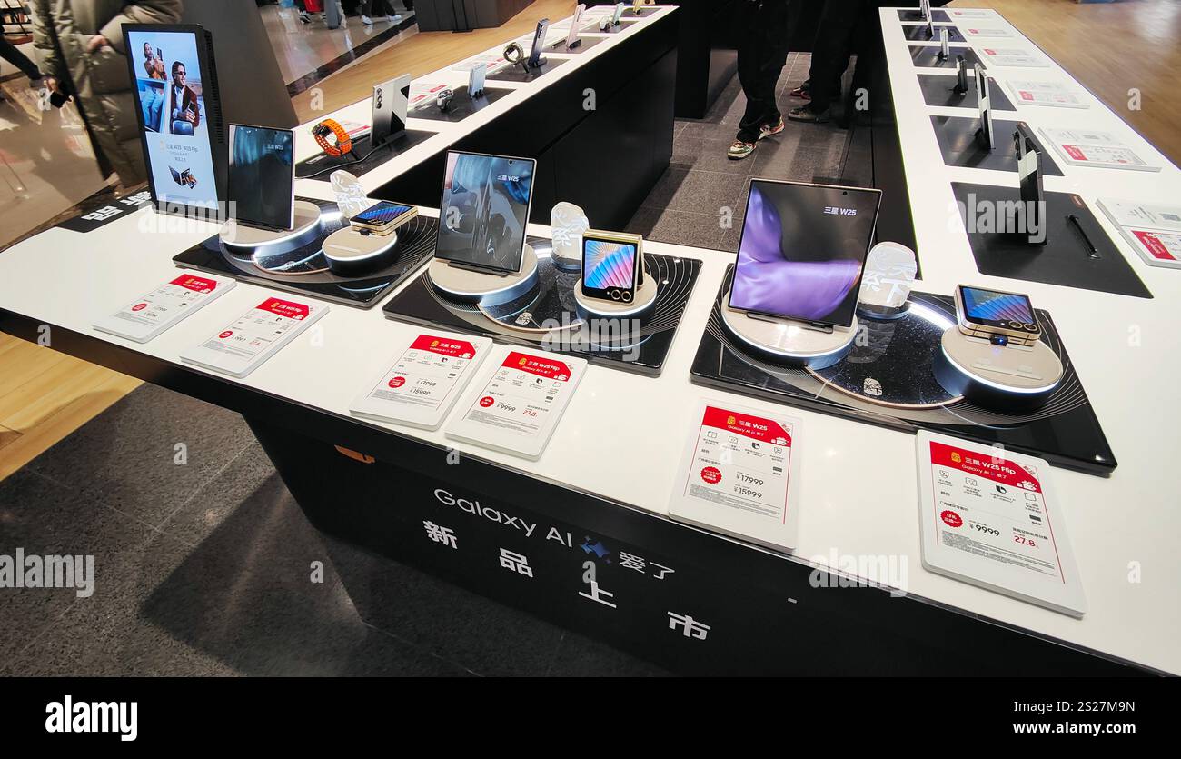 SHANGHAI, CHINA - JANUARY 4, 2025 - Mobile phones are seen for sale at ...