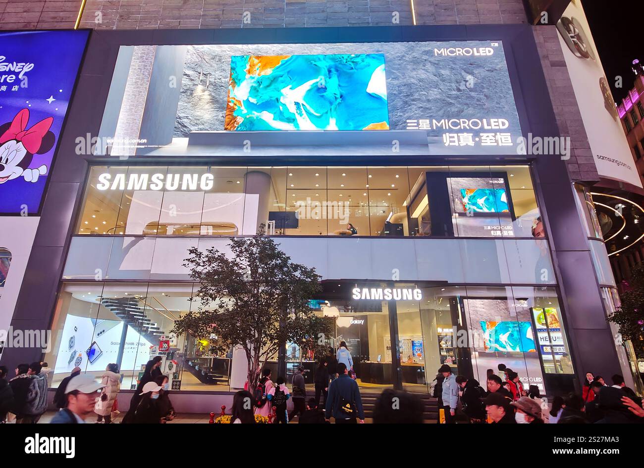 SHANGHAI, CHINA - JANUARY 4, 2025 - Pedestrians pass the flagship store ...