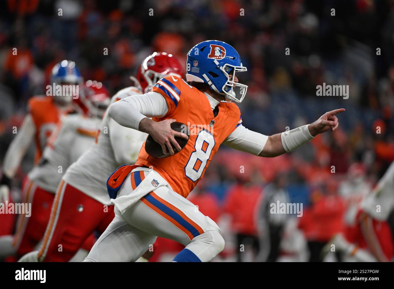 Denver Broncos quarterback Jarrett Stidham (8) runs in the second half ...