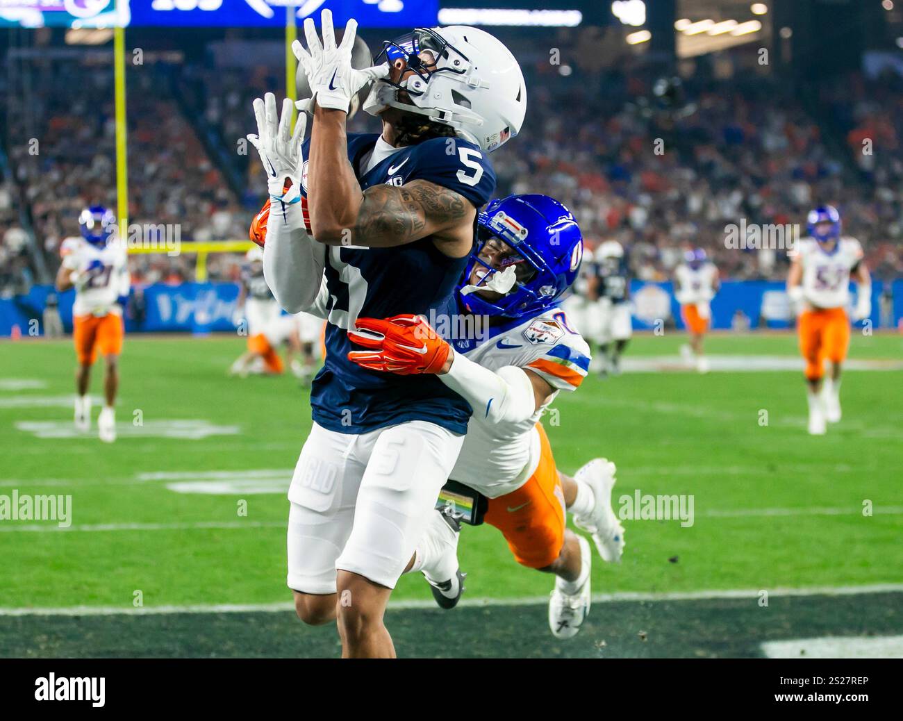 GLENDALE, AZ - DECEMBER 31: Penn State wide receiver Omari Evans (5) catches the ball for a ...