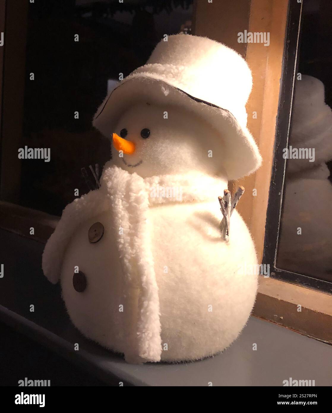 Hand-crafted snowman ornament on a window sill Stock Photo - Alamy
