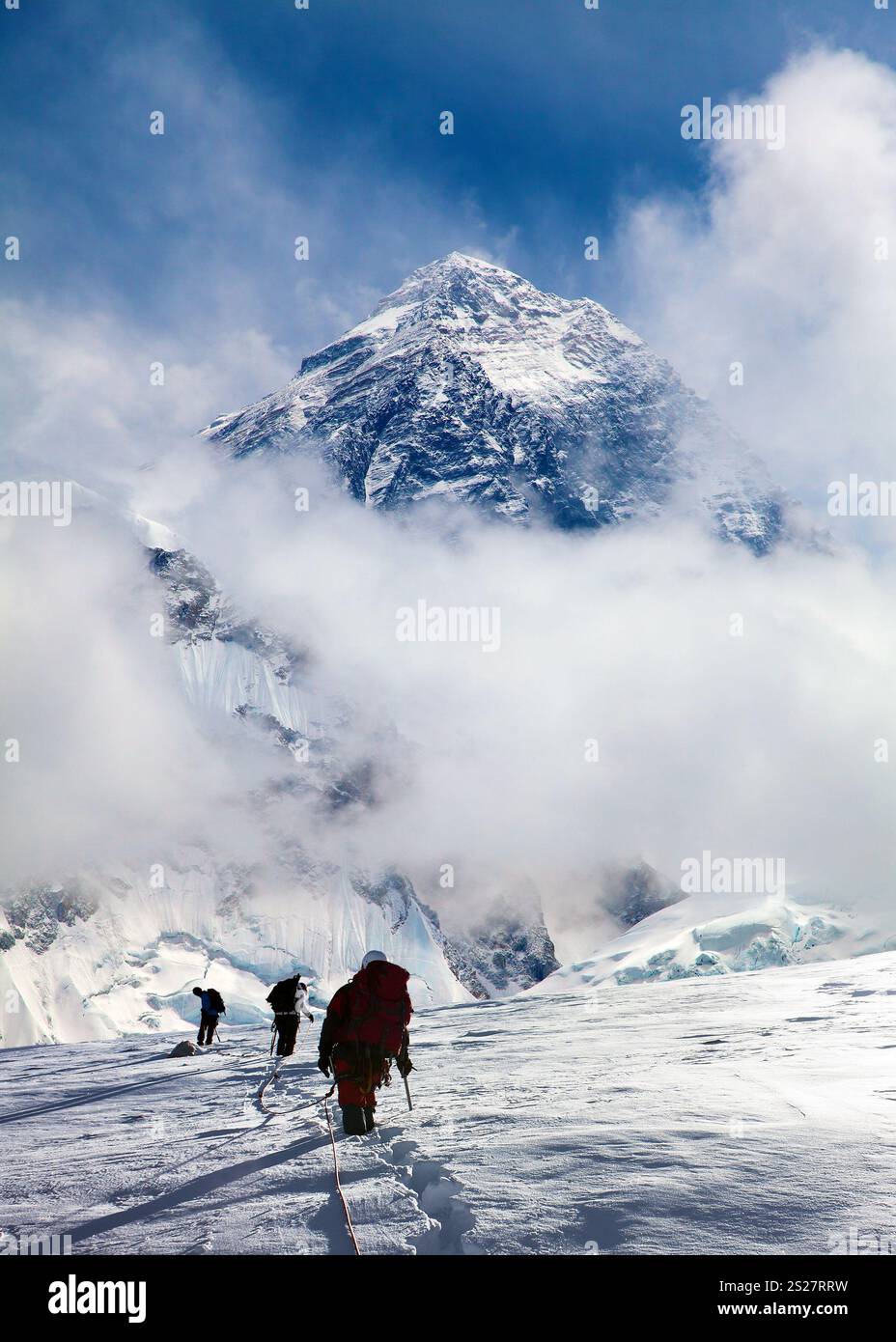 montage of three hikers on glacier and mount Everest, Mt Everest area ...