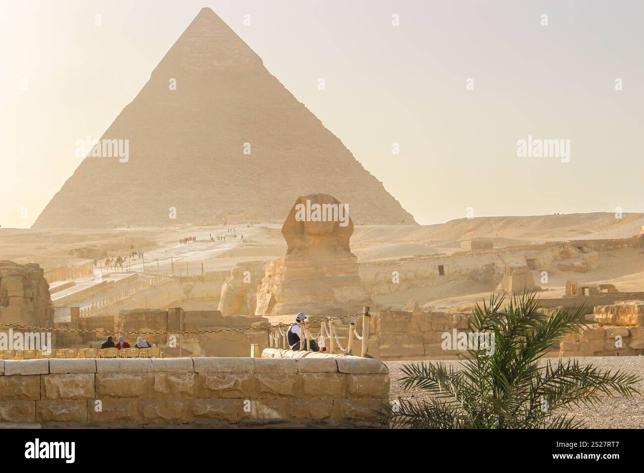 A stunning view of the Great Pyramid of Giza and the iconic Sphinx ...