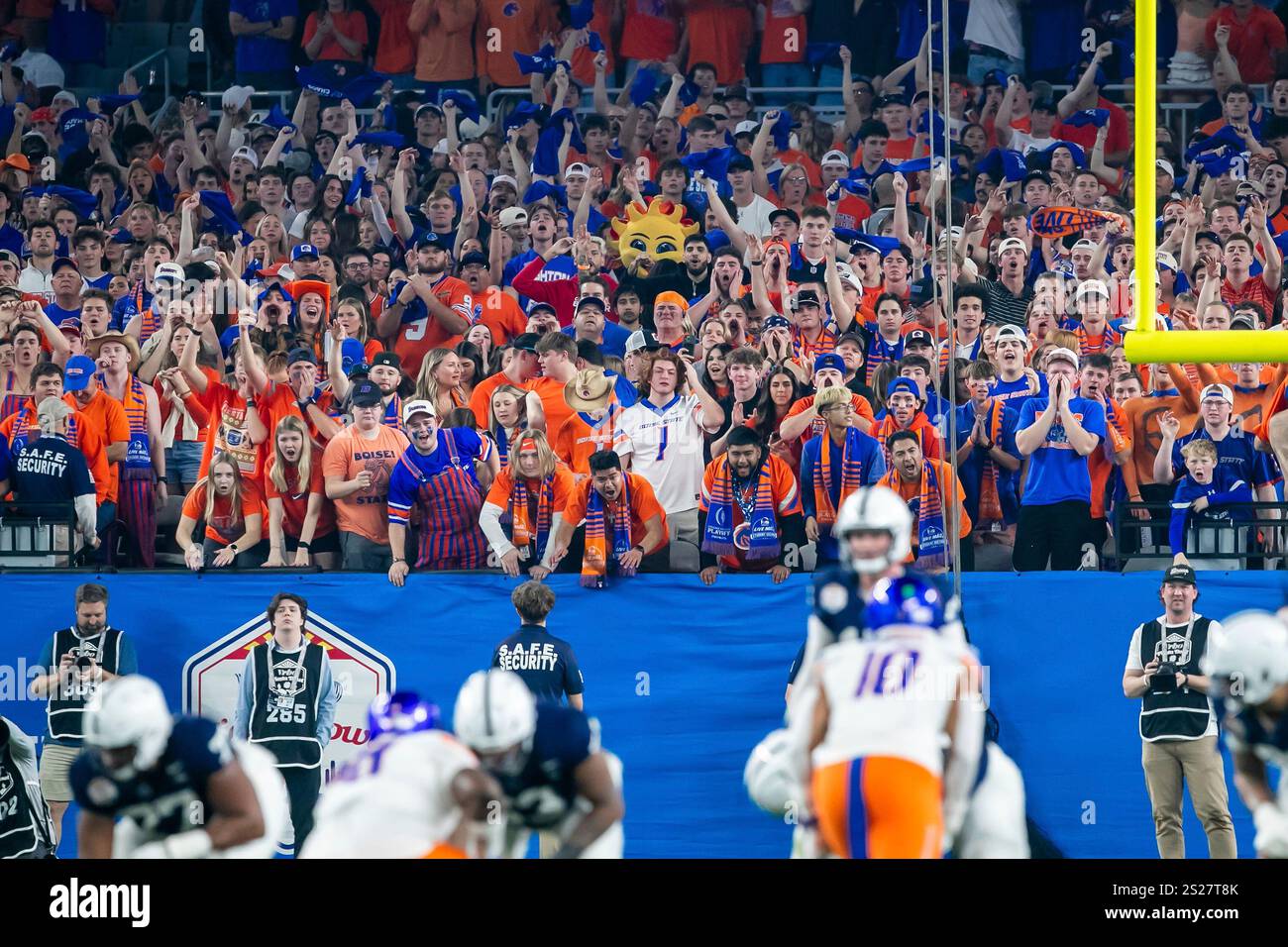 GLENDALE, AZ - DECEMBER 31: Boise State fans cheer on their team during the Penn State Nittany ...