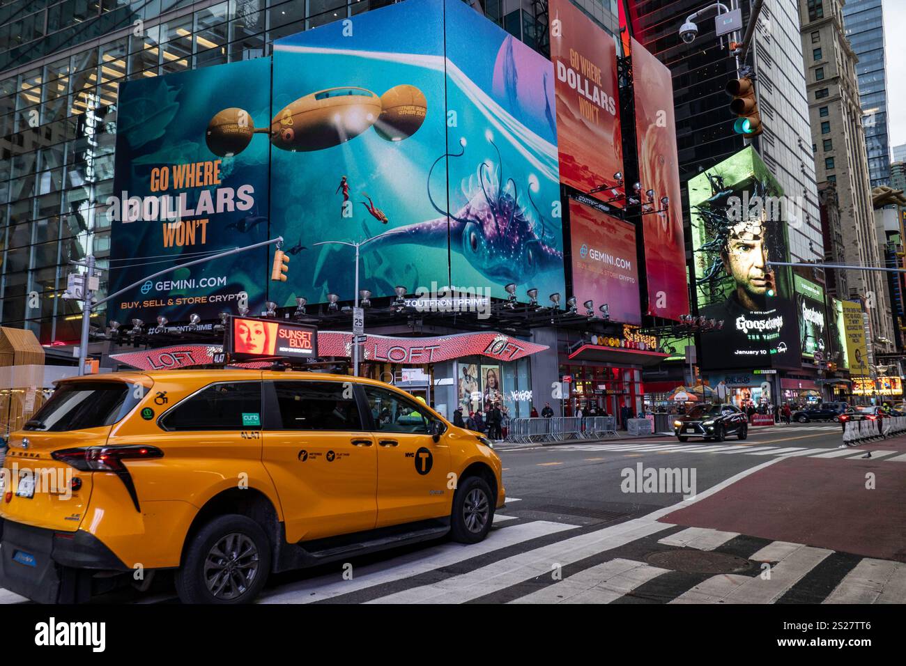 A massive vibrant LED display at the intersection of seventh Avenue and ...