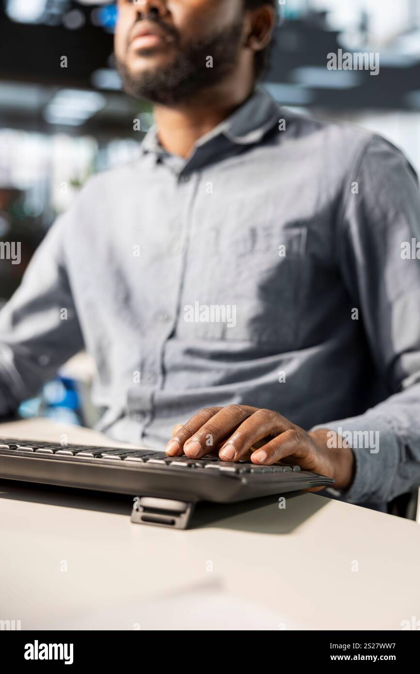 Executive manager in modern office engaged in infographics analysis for ...