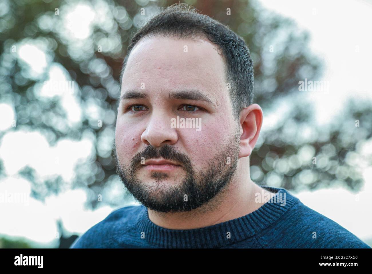Curious Man Looking Out For Someone Stock Photo - Alamy